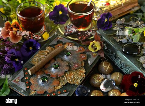 Still Life With Magic Book Of Spells Runes And Flowers Occult
