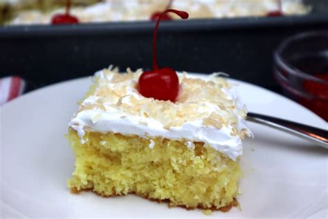 Easy Pina Colada Poke Cake Recipe The Freckled Cook