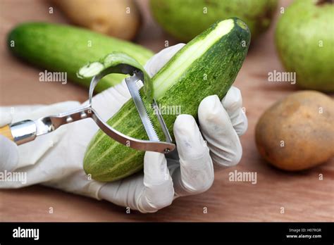 Peeling Off Cucumber Stock Photo Alamy