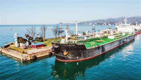 Lpg Tanker Ship Docked At Industrial Terminal For Gas Loading Or