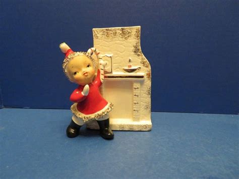 Ucagco Pixie Girl Wearing Santa Suit Holding Candy Cane Candy Etsy Santa Suits Candy Cane