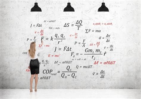 Premium Photo Blond Woman Writing Formulas On Concrete Wall