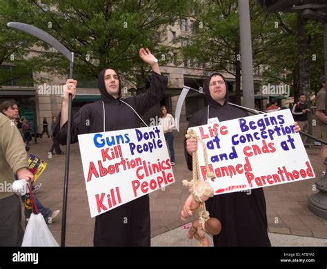 Two Pro Life Demonstrators Mock Feminist Protesters At The March For