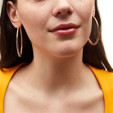 570mm Oval Hoop Earrings In Sculpted Hollow 14k Gold Zales