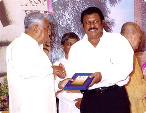 S Rajagopal 50faces English