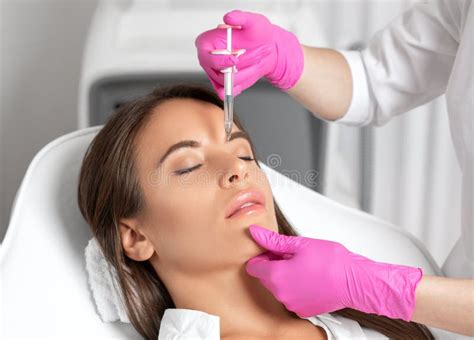 The Doctor Does Injections To Correct The Hump On The Nose With The