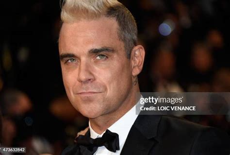 Robbie Williams Portraits Photos And Premium High Res Pictures Getty
