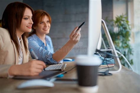 creative web designers working together on new web site project stock