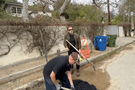 Arnold Schwarzenegger Just Fixed A Big Pothole To Protect Cyclists