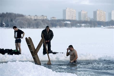 Epiphany Russian Orthodox Christians Plunge Into Frozen Rivers And