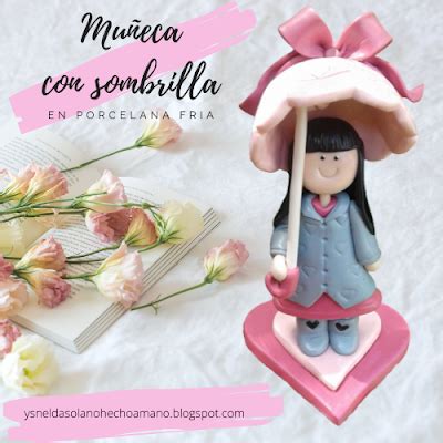 Muñeca con sombrilla en porcelana fría Ysnelda Solano Hecho a Mano