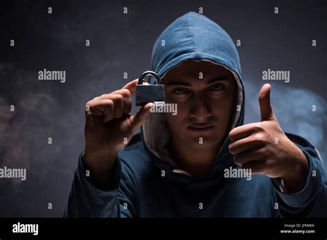 Computer Hacker Working In Dark Room Stock Photo Alamy