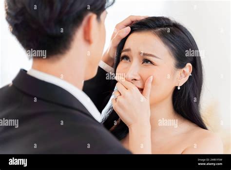 Emotional Asian Bride Tears Up In Tender Moment With Groom At Their