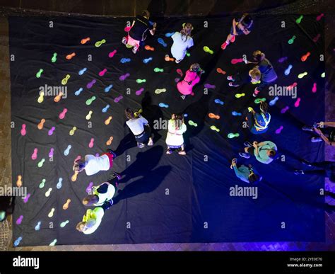 Editorial Use Only An Aerial View Of A Display Of Uv Lit Footsteps As
