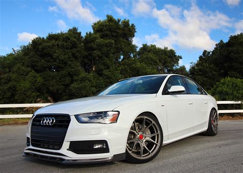 white audi a4 stands out with custom front lip spoiler gallery