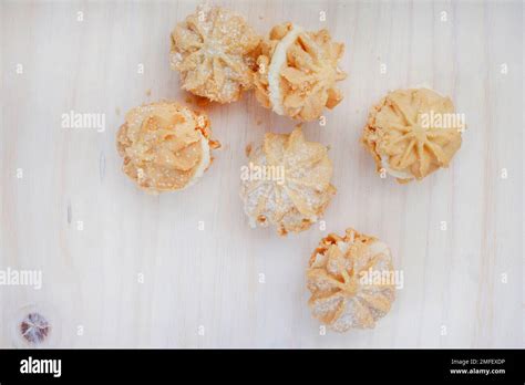 Homemade Melting Moment Or Yo Yo Biscuits In Corner With Copy Space On