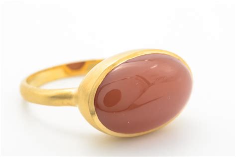 Kranz Ziegler Couture ring med orange månesten 14 kt guld str 54