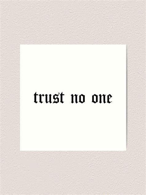 The Words Trust No One Written In Black Ink On A White Paper Background