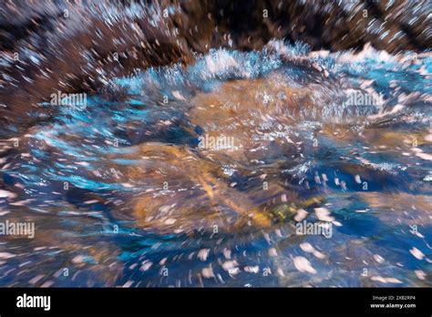 This Image Showcases Abstract Reflections On Seawater Featuring A Captivating Interplay Of