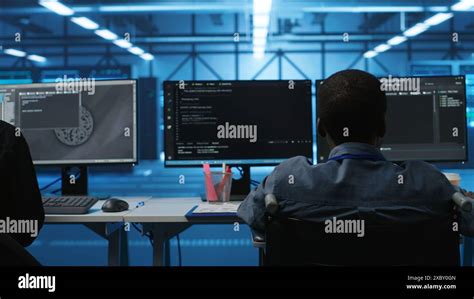Person With Disability Next To Multiracial Coworkers In Data Center