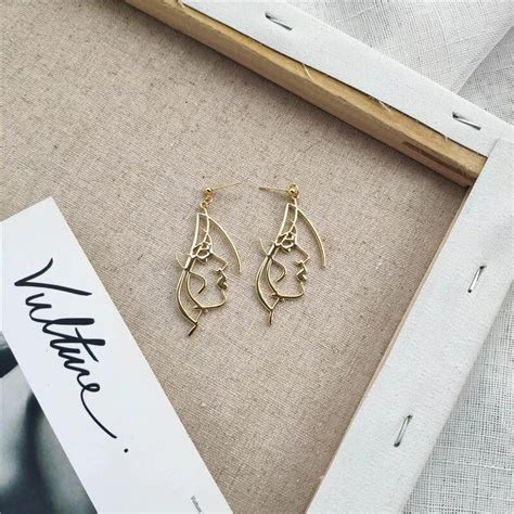 Серьги сережки лица девушки золотистые — цена 75 грн в каталоге Серьги Купить аксессуары по