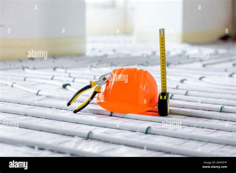 Tools For Repair Hard Hat Plier Glove On Warm Floor Installation Of