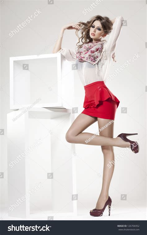 Beautiful Woman With Long Sexy Legs Dressed Elegant Posing In The