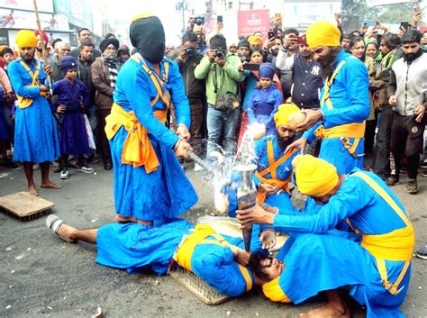 Sikh Devotees Show Their Skills During A Nagar Kirtan