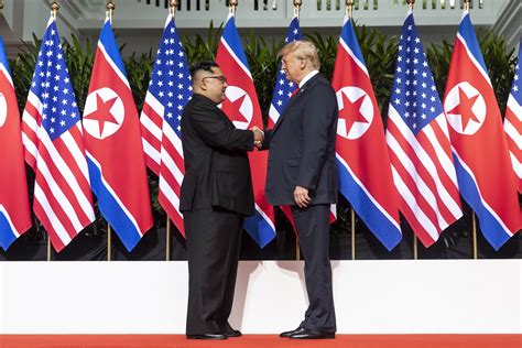 Filekim And Trump Shaking Hands At The Red Carpet During The Dprkusa