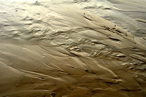 Free Water Flowing Over Sand Stock Photo FreeImages