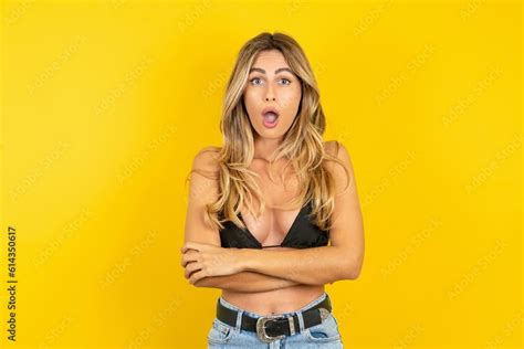 Shocked Embarrassed Young Beautiful Blonde Woman Wearing Bikini Over