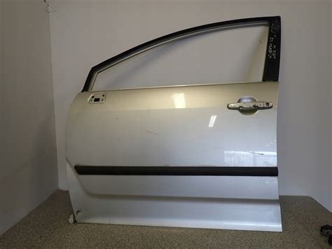 TOYOTA COROLLA VERSO 04 09 DRZWI PRZEDNIE LEWE 1C0 12143016791