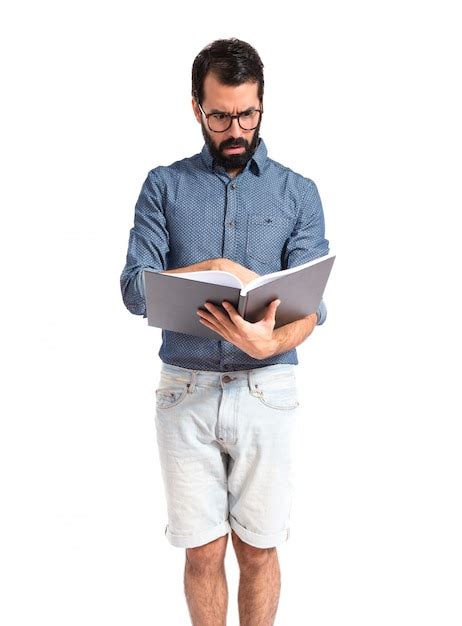 Premium Photo Young Hipster Man Reading A Book