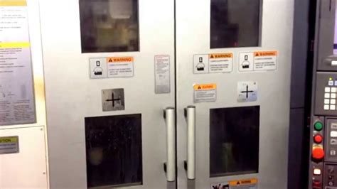 Okuma Model 2sp 150h Twin Spindle Cnc Turning Center With Gantry Loader Youtube