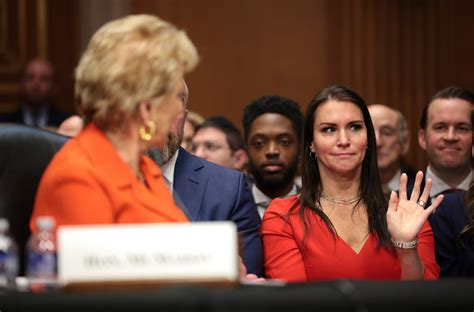Wrestler Triple H Sitting Behind Linda Mcmahon At Hearing Delights