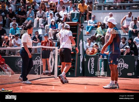 Clement Tabur Of France And Li Tu Of Australia During The Qualifying Of The Roland Garros 2025