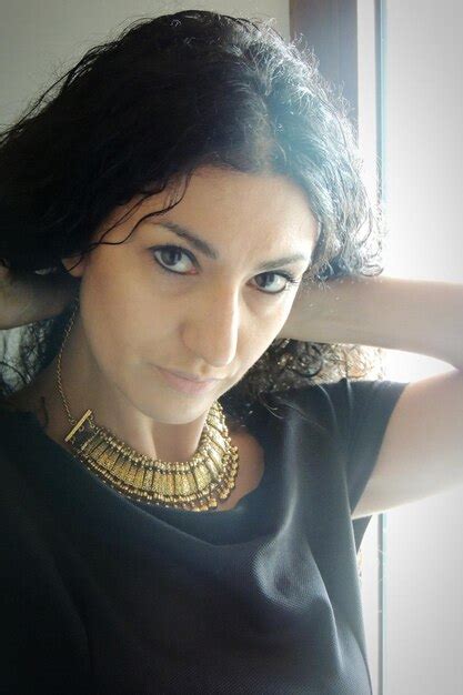 Premium Photo Portrait Of Woman Wearing Necklace At Home