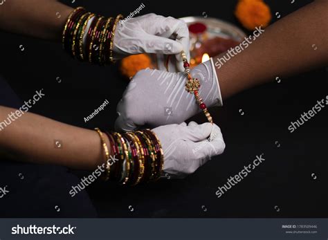 105 Sister Tying Rakhi On Her Brothers Wrist On Occasion Raksha