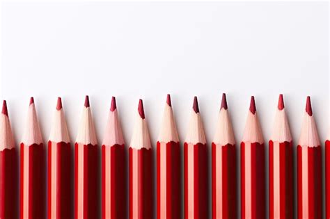 Premium AI Image Red Colored Pencil On A White Backdrop