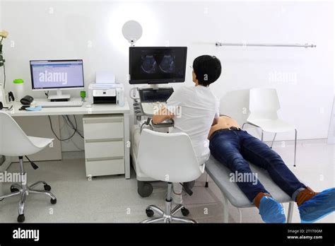 Ultrasonic Examination Of Internal Organs A Man On An Abdominal