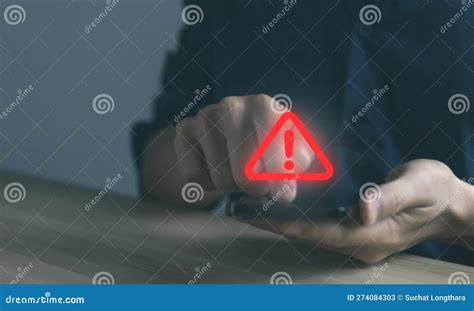 Use A Smartphone Showing A Warning Triangle And An Exclamation Mark