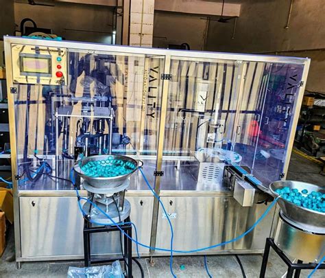 Cap Assembly Machine Double Cavity Cap Wadding Machine Manufacturer