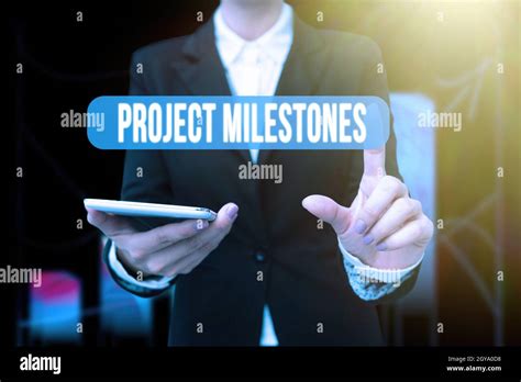 Hand Writing Sign Project Milestones Word For Duration That Shows An