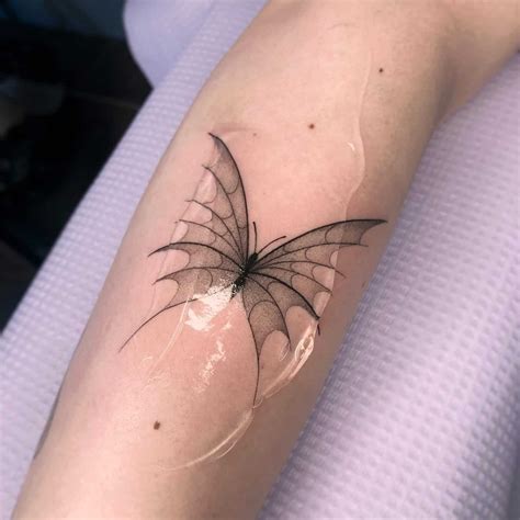 Small Black Butterfly Tattoos On Wrist