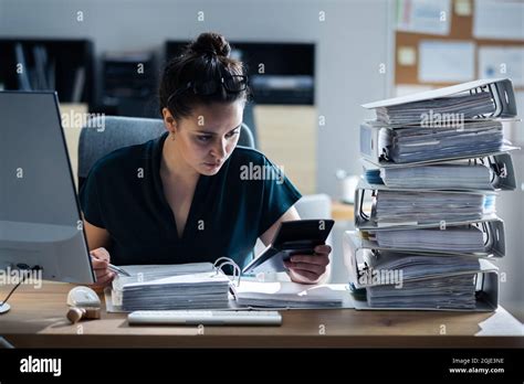 Workaholic Working On Desktop Computer At Night Stock Photo Alamy