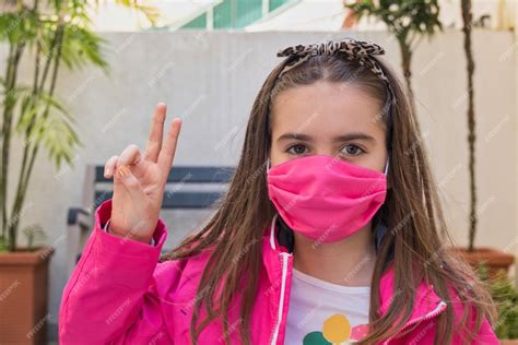 Premium Photo Portrait Of A Girl In Pink Mask