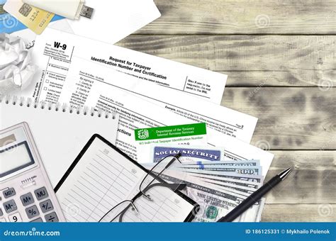 Irs Form W 9 Request For Taxpayer Identification Number And Certification Lies On Flat Lay