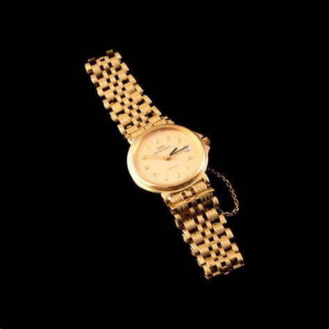 Reloj R010 Gold Collection