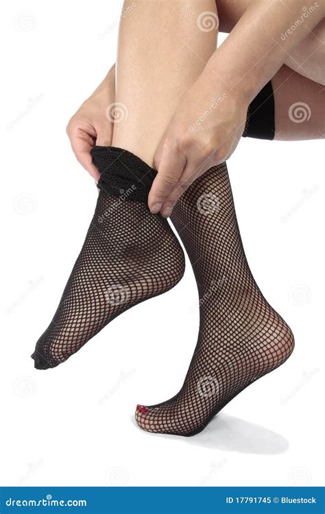 Woman Feet With Fishnet Stockings Over White Royalty Free Stock Photo Image