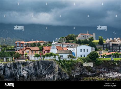 View Of Llanes Asturias Spain With Lighthouse And Ermita Virgen De